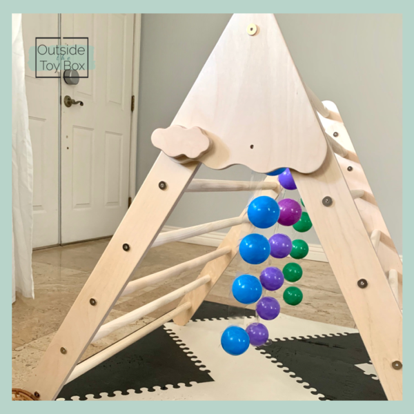 How to Use the Pikler Triangle Besides Climbing - Outside the Toy Box