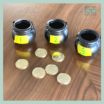 8 St. Patrick's Day Gold Coin Activities for Toddlers - OutsideTheToyBox
